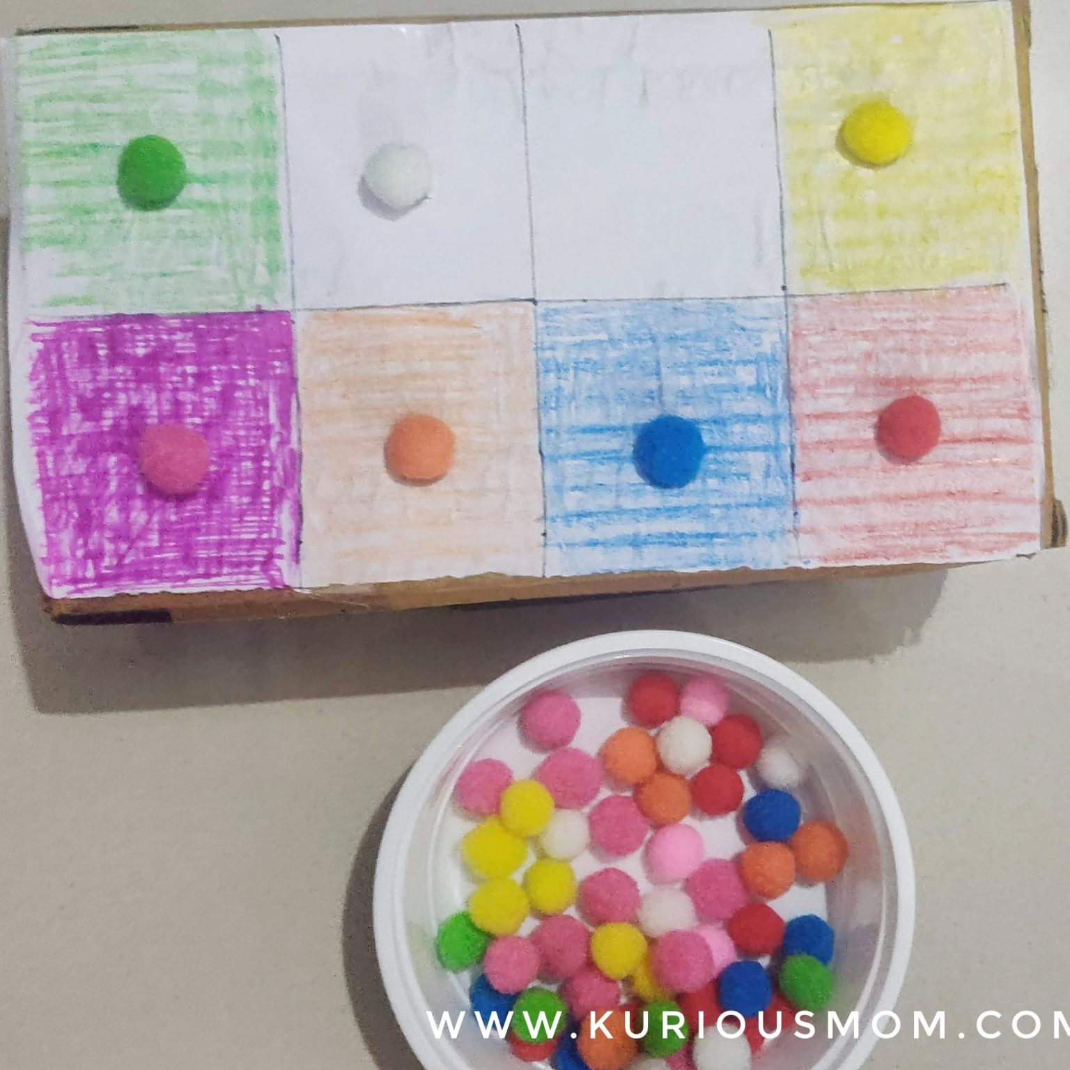Pompom colour sorting with cardboard box - KuriousMom